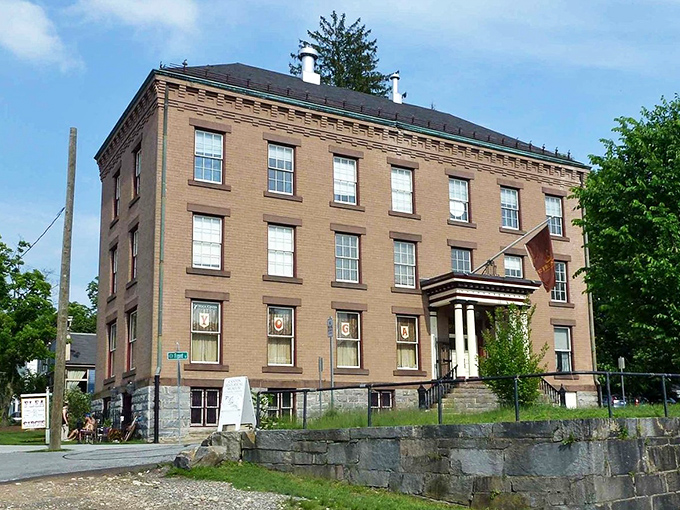 This imposing brick edifice has witnessed more Connecticut history than a Yale professor. Its columns stand like guardians of a more dignified architectural era.