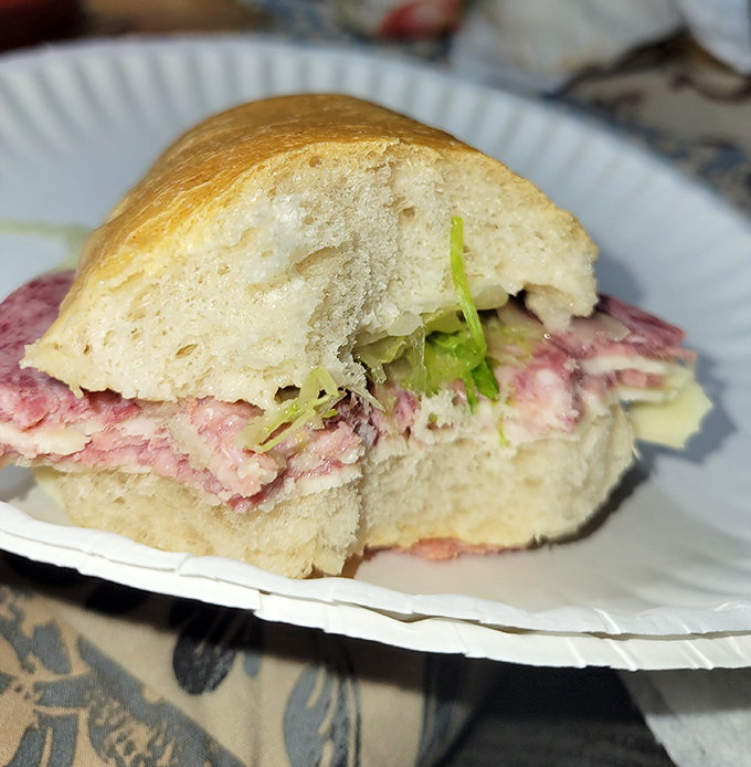 Like reading the rings of a tree, you can count the layers of meat in this cross-section. Historians may someday call this the Sandwich Age.