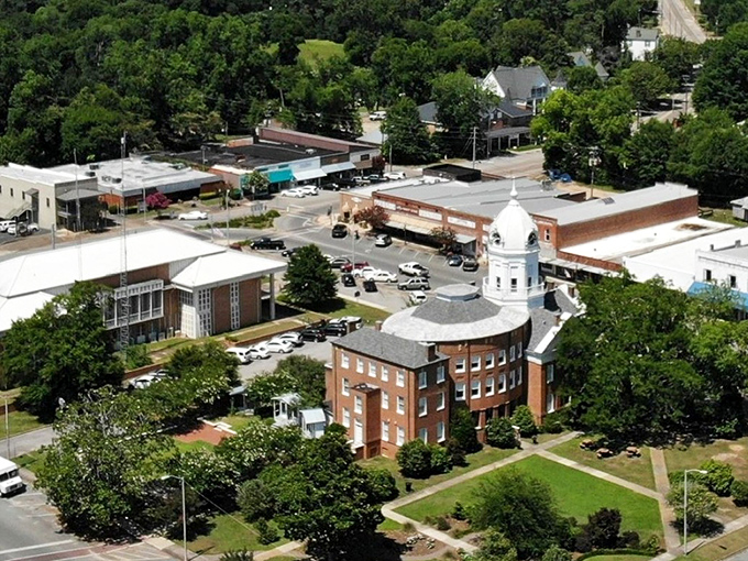 From above, Monroeville reveals its thoughtful layout, with the courthouse standing proud at center stage like the town's cultural heartbeat.