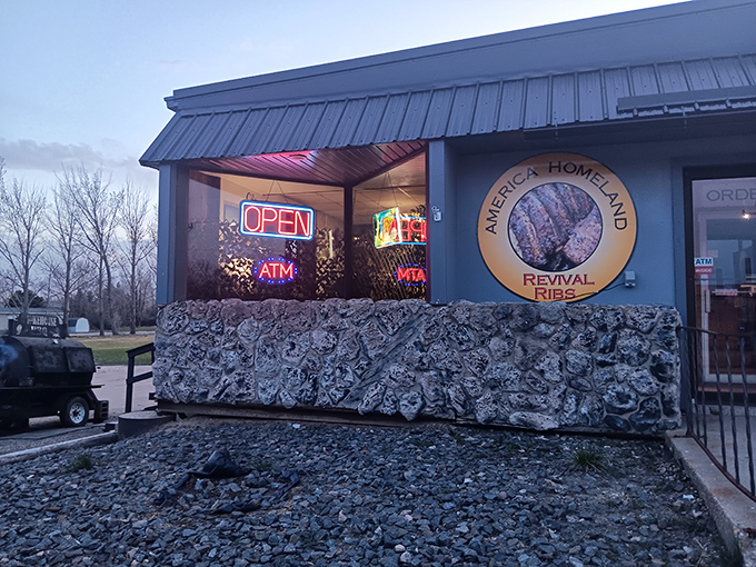 America Homeland Revival Shop glows with welcome as dusk settles, its stone facade and neon signs a beacon for locals and visitors alike.