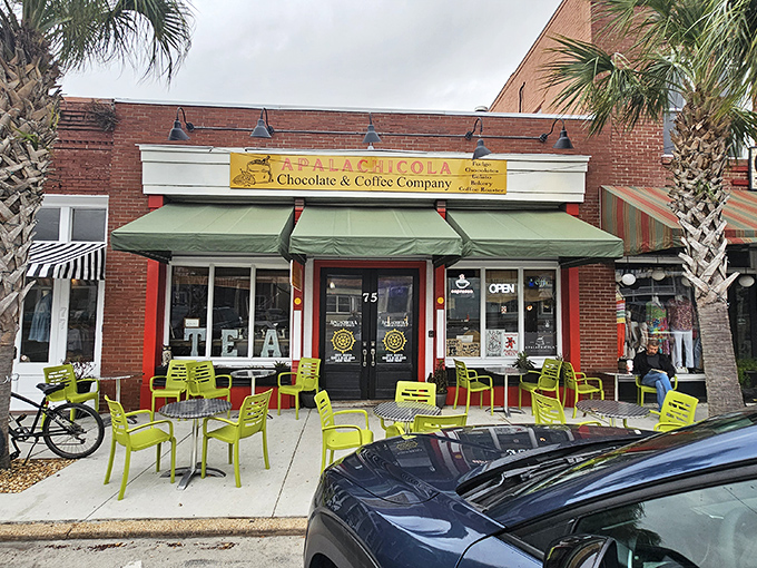 The Apalachicola Chocolate & Coffee Company beckons with bright yellow charm and lime-green chairs &ndash; resistance is futile, caffeine pilgrims.