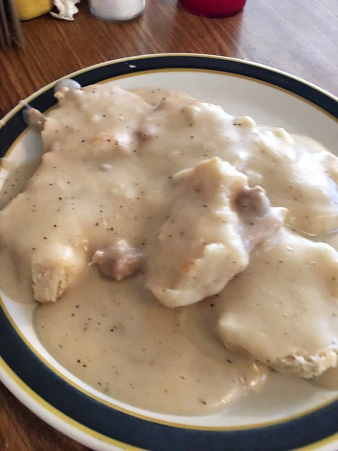 Biscuits and gravy so creamy and peppery they could make a vegetarian question their life choices. Pure comfort on a plate.