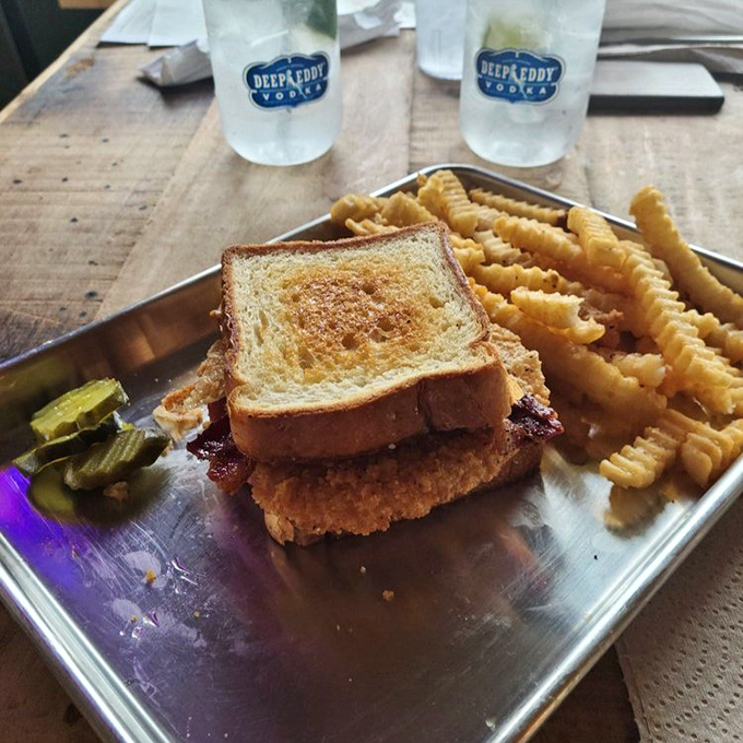 A sandwich that understands the importance of proper construction &ndash; crispy, savory, and served with those crinkle-cut fries that taste like childhood.