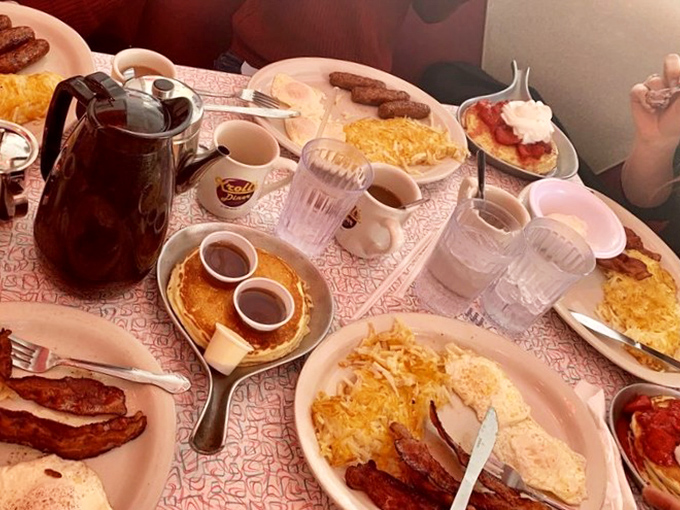 Breakfast at Kroll's isn't just a meal—it's a table-covering celebration where pancakes, eggs, and bacon perform a harmonious symphony on your taste buds.