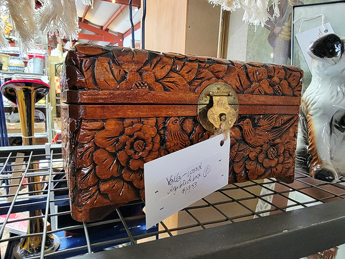 This intricately carved wooden box has likely held secrets for decades. What treasures will it safeguard in its next chapter?