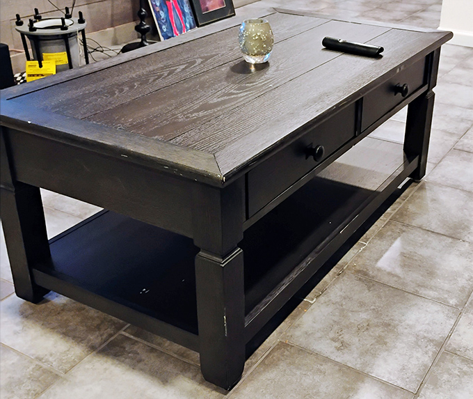 This rustic coffee table with practical drawers answers the eternal question: "Where did I put the remote?" once and for all.