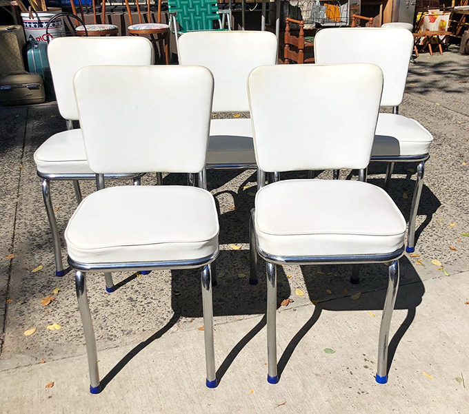 Mid-century chrome and vinyl dining chairs that would make Don Draper nod approvingly&mdash;the perfect seating for your next Manhattan.