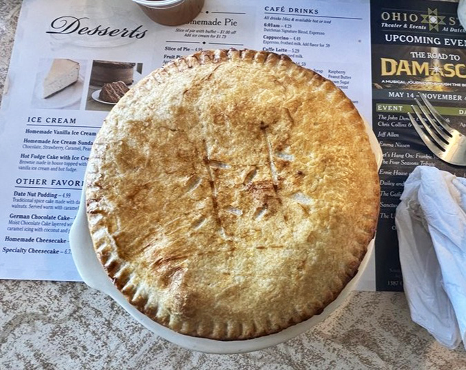 A chicken pot pie so massive it could double as a centerpiece at Thanksgiving dinner before anyone takes a bite.