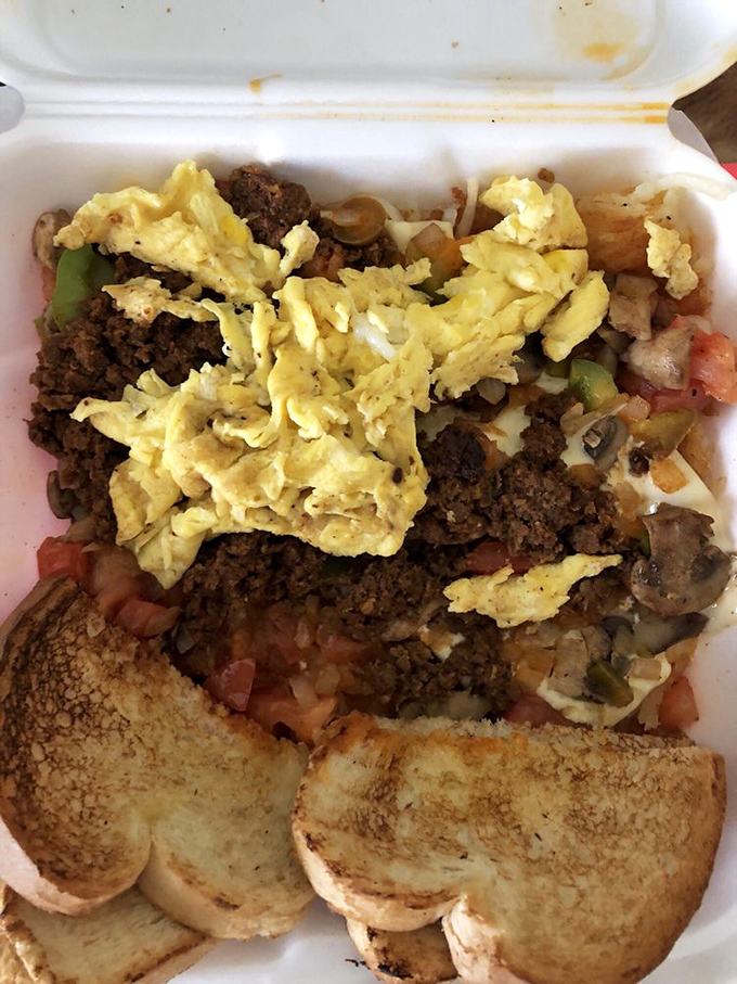 This to-go breakfast skillet is what happens when eggs, ground beef, and vegetables have a delicious family reunion on a bed of toast.