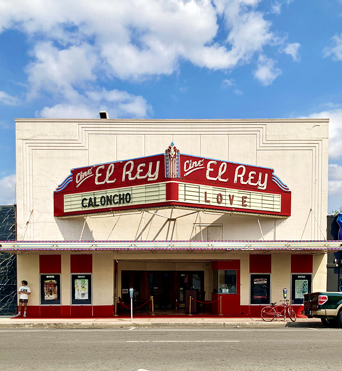 Cine El Rey's vintage marquee lights up downtown with retro charm, promising entertainment that doesn't involve scrolling through Netflix for 45 minutes.