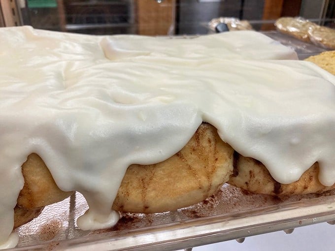 These cinnamon rolls don't just get frosted &ndash; they get blanketed in creamy icing that cascades down the sides like a delicious winter avalanche.