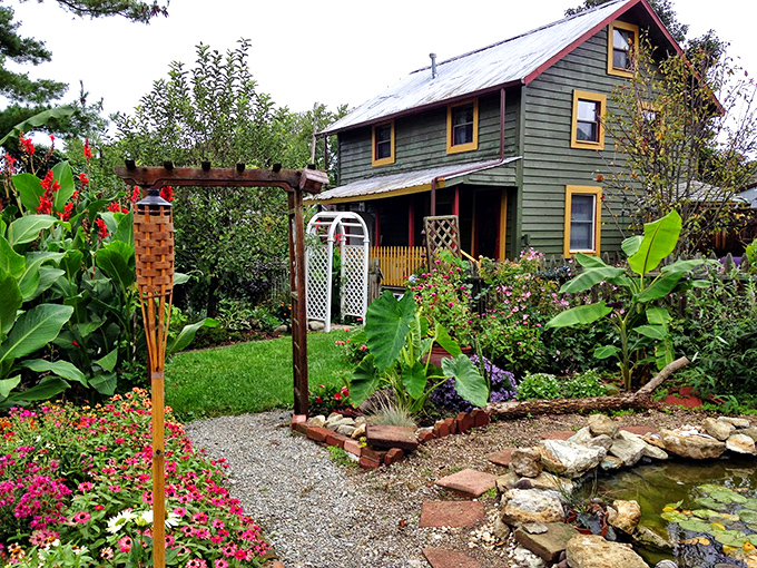 Quaint cottages like this one offer a glimpse into Clifton's residential charm, where gardens flourish and porches welcome weary travelers.