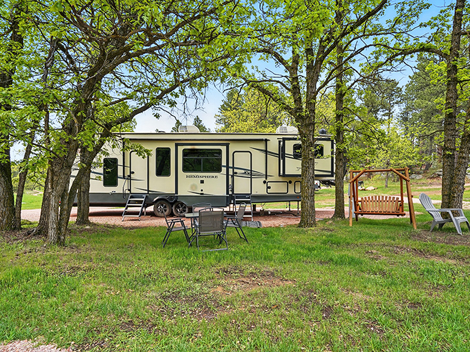 Camping perfection: where your RV becomes a front-row seat to nature's greatest show, complete with porch swing intermissions.