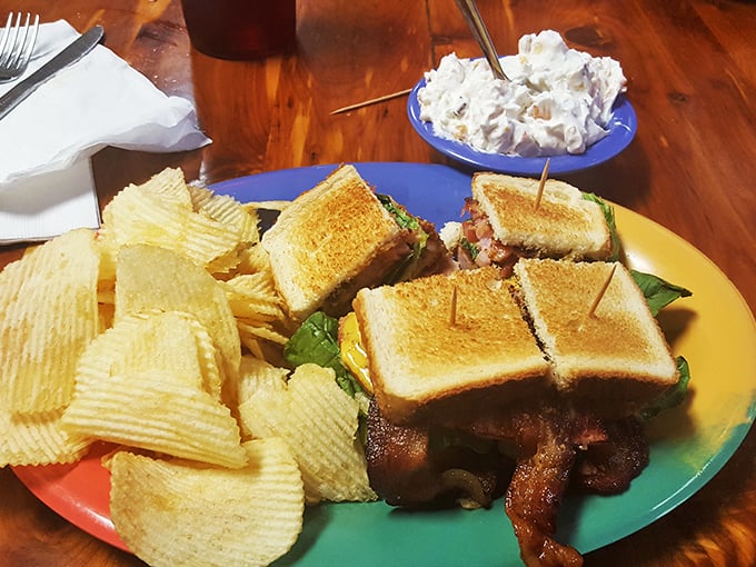 The club sandwich arrives with chips standing at attention, as if they know they're in the presence of sandwich royalty.