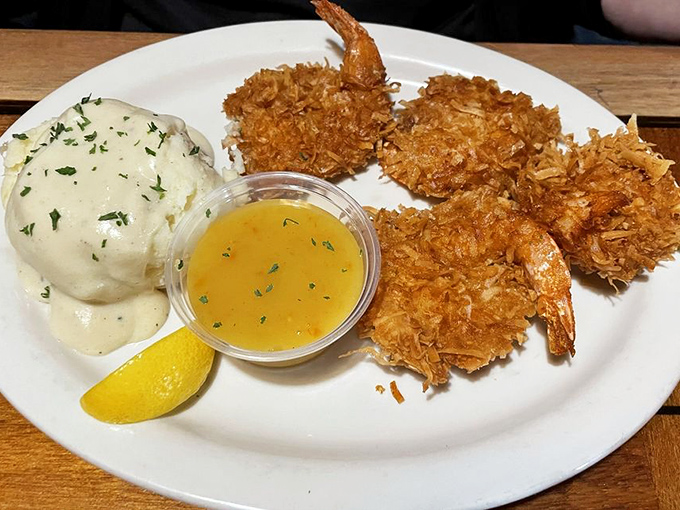 These coconut shrimp aren't just fried&mdash;they're transformed into golden-armored treasures that crunch with tropical sweetness at first bite.