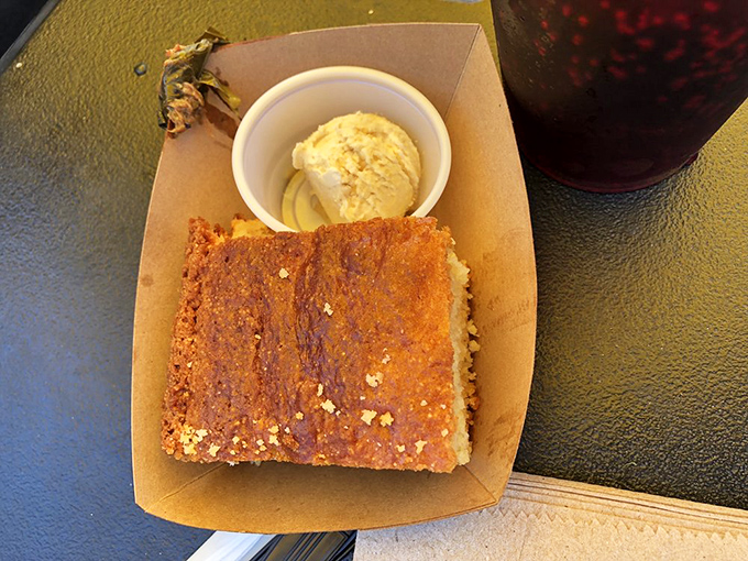Cornbread that walks the perfect line between sweet and savory, with honey butter melting into every warm, crumbly bite.