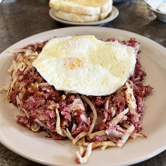 Corned beef hash that would make your grandmother weep with joy&mdash;topped with an egg that's perfectly sunny, just like your outlook after this meal.