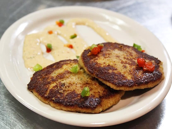 Golden-brown crab cakes that don't hide behind fillers&mdash;just pure crab goodness with a crispy exterior that shatters with each bite.