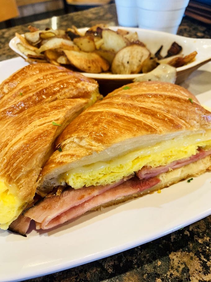 This croissant sandwich isn't just breakfast&mdash;it's breakfast wearing its Sunday best. Flaky, buttery layers cradle eggs and ham in a morning masterpiece.