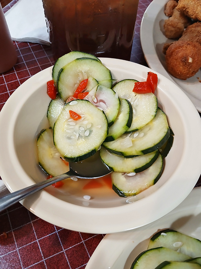 This cucumber salad isn't just a side&mdash;it's the refreshing intermission your taste buds need between acts of fried perfection.