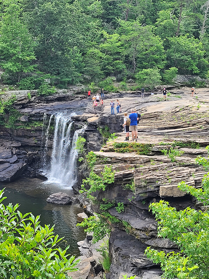 Nature's playground awaits at DeSoto State Park, where visitors gather at the edge of cascading waters that have been sculpting these rocks for millennia.