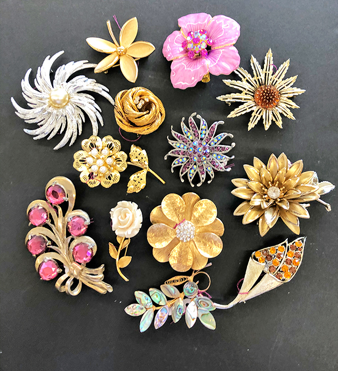 A garden of metal blooms that never wilt. These vintage brooches tell stories of church Sundays and anniversary celebrations from another era.