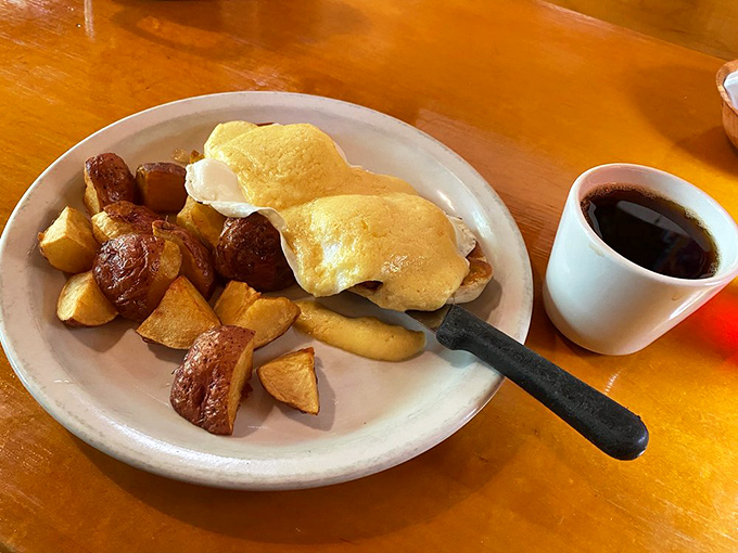 Golden potatoes sharing a plate with perfectly poached eggs&mdash;a breakfast duet that performs the morning's most beautiful symphony.