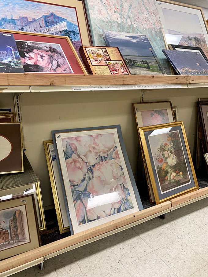 Wall art waiting for its second act. That floral print might be exactly what your guest bathroom has been missing all these years.