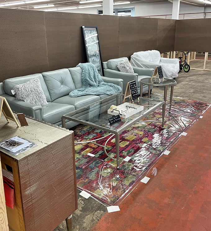 Mid-century modern meets contemporary comfort in this stylish living room setup, complete with that perfect conversation-starting area rug.