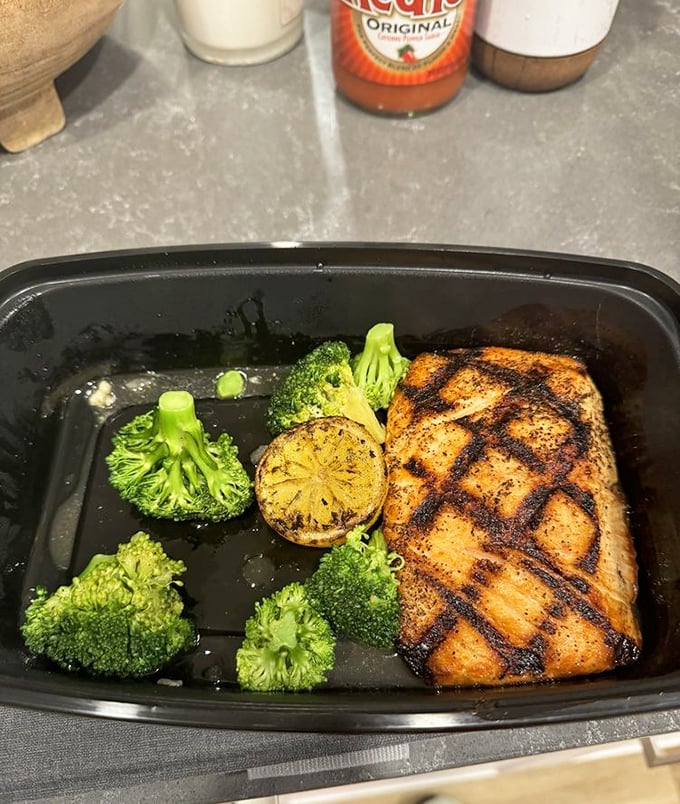 Grill marks aren't just decoration&mdash;they're flavor tattoos. This salmon with its charred crosshatch pattern and fresh broccoli is healthy eating you'll actually crave.