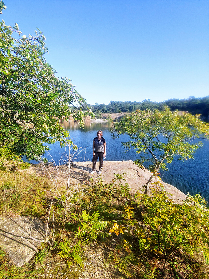 Nature frames the perfect portrait spot where the quarry's blue waters create a backdrop worthy of the most discerning Instagram curator.