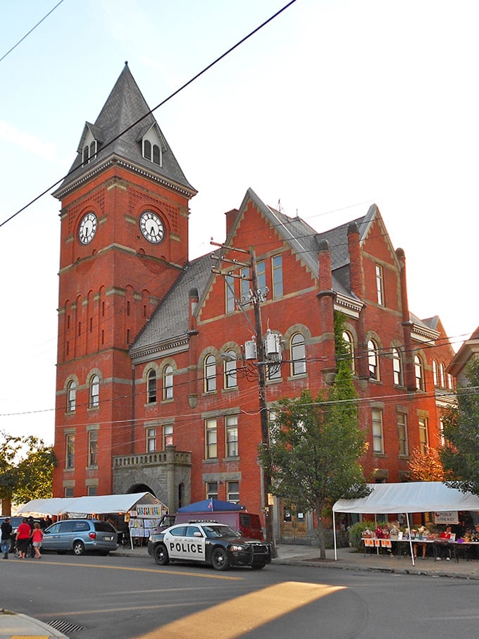 The iconic red brick clock tower keeps time for a community where your dollar stretches further than your weekend plans.