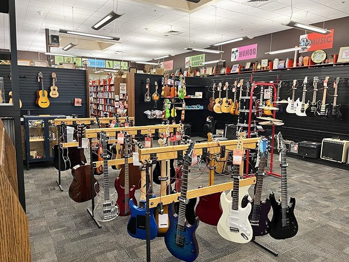 The instrument section isn't just a display&mdash;it's a silent concert waiting to happen. Electric guitars in every color stand ready for their next rock star.