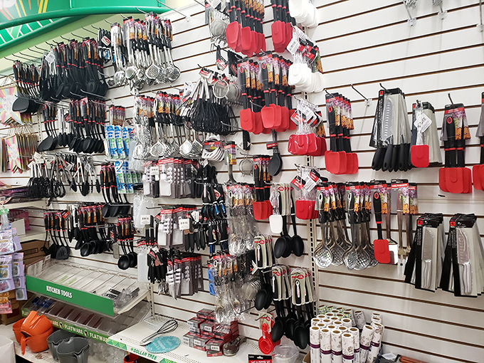 Kitchen gadget nirvana where spatulas, whisks, and measuring spoons hang like culinary jewelry, waiting to transform your cooking game without transforming your bank balance.