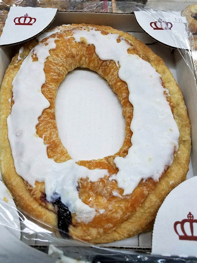 The Danish kringle, royalty among pastries. That white glaze isn't just icing—it's the finishing touch on a breakfast masterpiece.