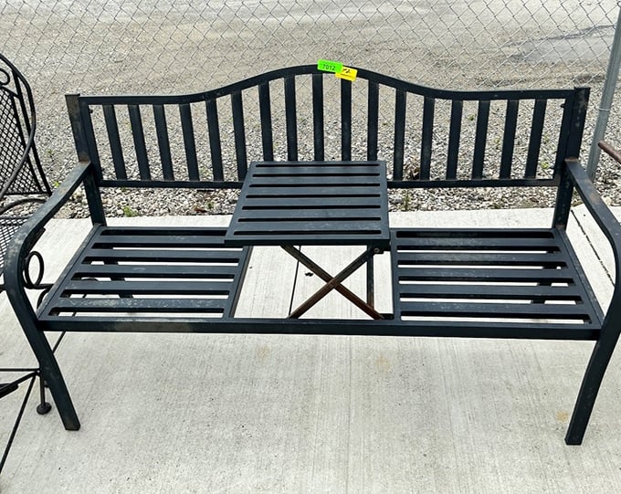 Not just a bench, but a conversation starter for your garden. This metal beauty asks, "Why sit inside when you could be enjoying Iowa's summer evenings?"