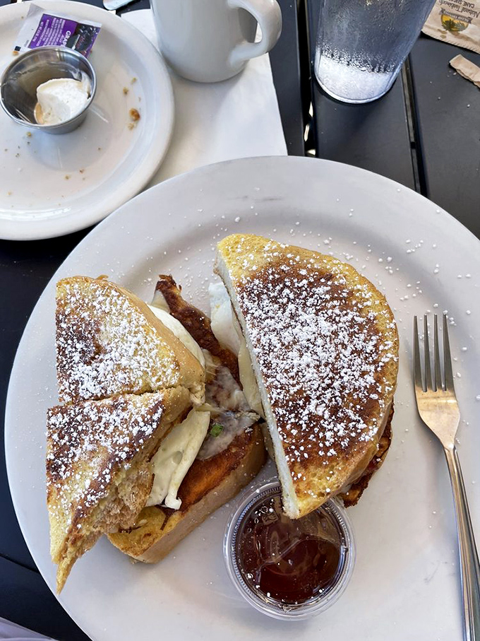 This isn't just French toast&mdash;it's a sandwich that decided to dress up for the occasion. Powdered sugar snowfall included.