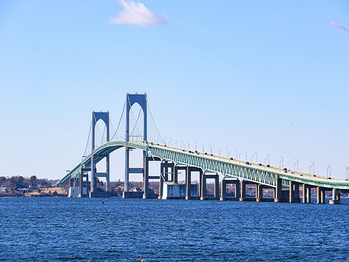 The Newport Bridge arcs gracefully across the bay &ndash; a man-made marvel that's equal parts engineering achievement and accidental Instagram backdrop.