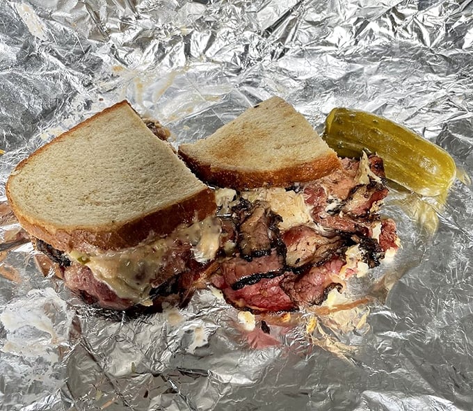 Pastrami that would make a New Yorker weep with joy, nestled between bread that knows its supporting role. The pickle is there to cut the richness, not that you'll need it.