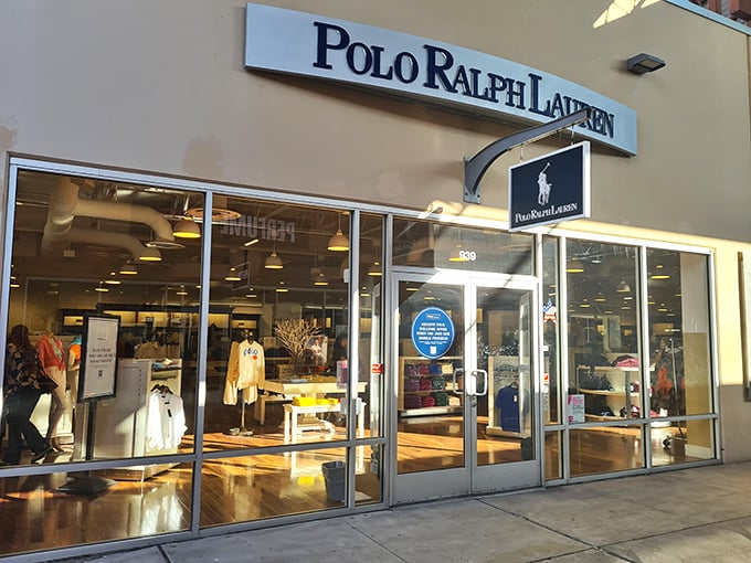 The Polo Ralph Lauren storefront beckons with promises of preppy classics at prices that won't make your credit card weep.