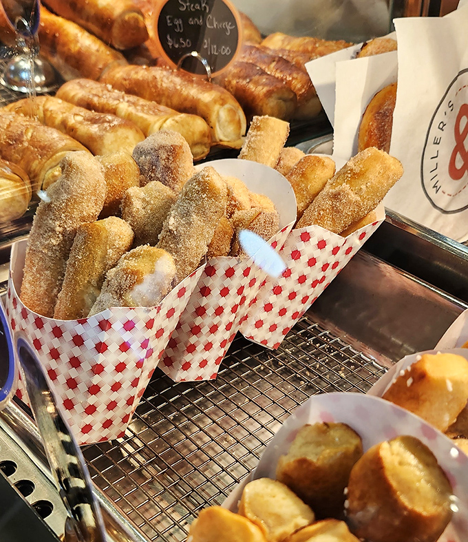 Pretzel sticks dusted with cinnamon sugar, standing at attention like delicious little soldiers ready for duty.