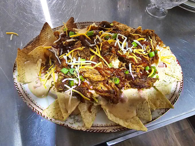 Nachos that don't mess around&mdash;loaded with pulled pork, cheese, and enough toppings to make you consider using a fork. Almost.