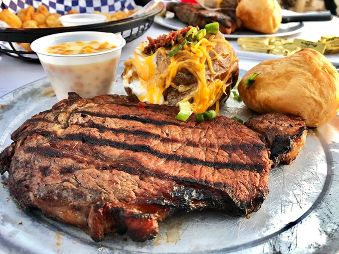 A steak that demands respect, grill marks like battle scars of deliciousness. That loaded baked potato isn't playing second fiddle&mdash;it's a co-star.