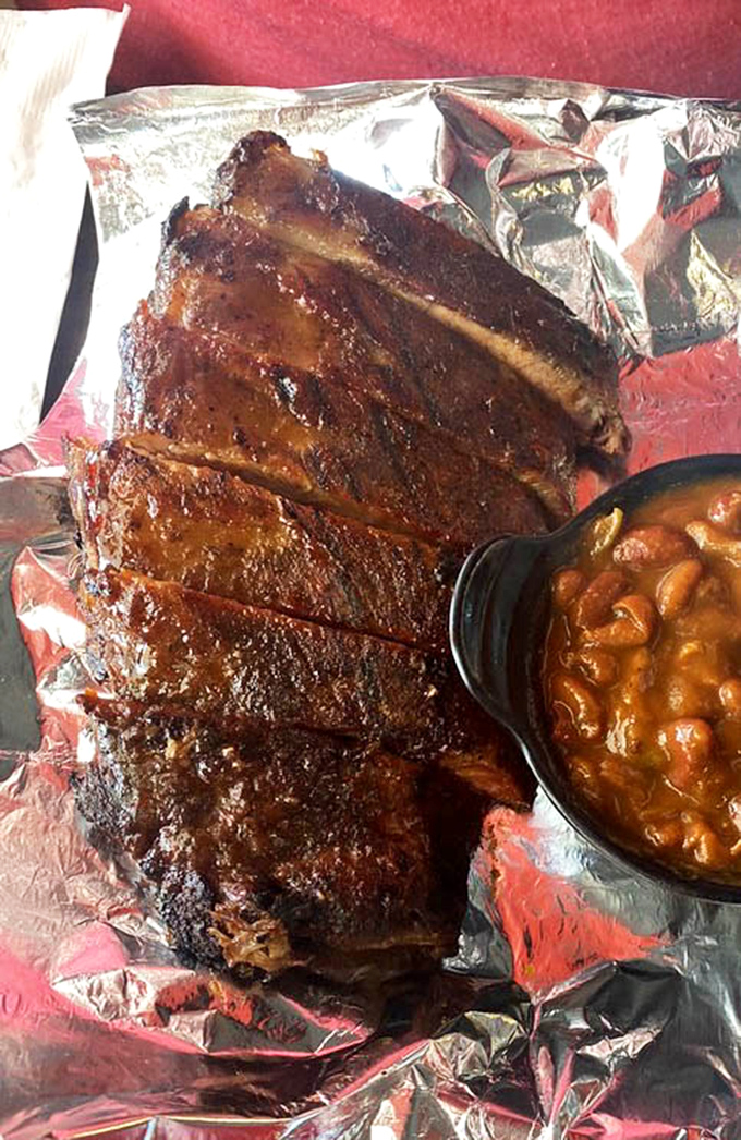 These ribs don't just fall off the bone&mdash;they practically leap onto your plate, bringing along a perfect companion of baked beans.