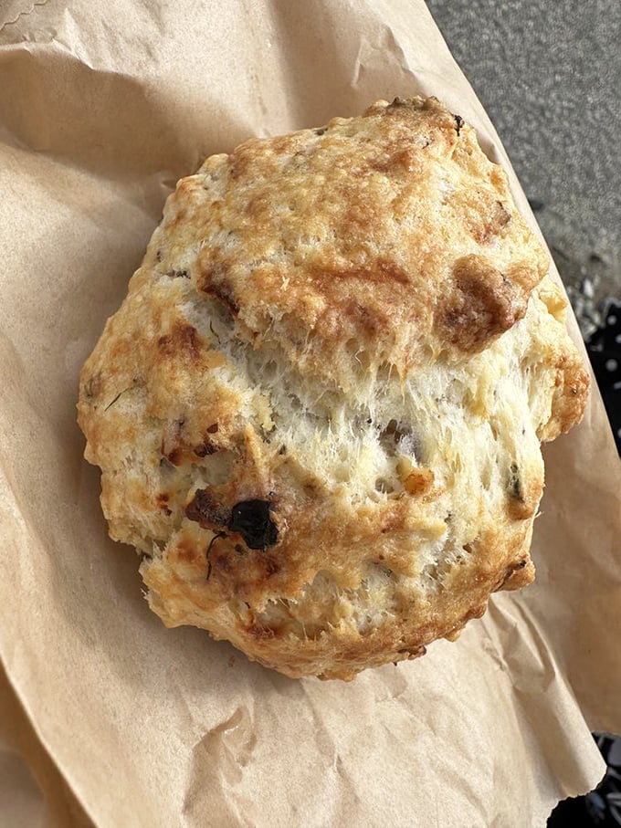 A proper Maine scone doesn't apologize for being rustic. This golden beauty has the kind of flaky layers that would make a French pastry chef weep with joy.