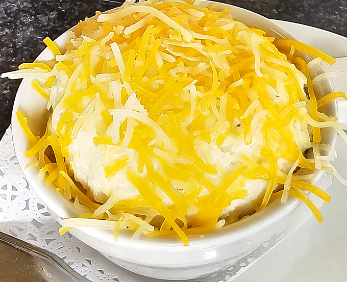 Comfort in a bowl! This hearty shepherd's pie topped with a mountain of melted cheese is what winter afternoons in Alaska were made for.