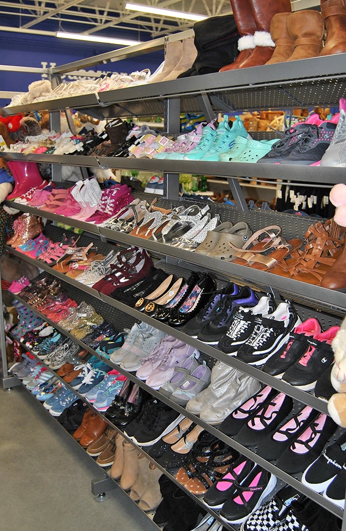 Shoes lined up like hopeful contestants in a beauty pageant where the prize is getting to leave with you.