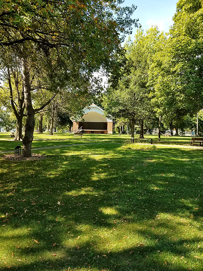 Sunset Park's bandshell waits patiently among the trees, ready for its next performance&mdash;nature provides the backdrop, humans provide the melody.