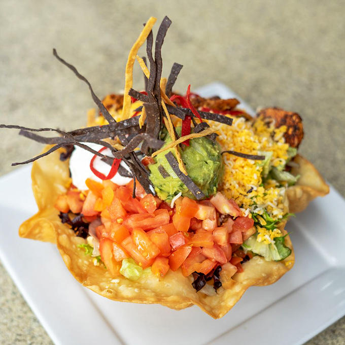 This isn't just a taco salad&mdash;it's an architectural marvel of crispy, creamy, and crunchy textures that defies both gravity and restraint.
