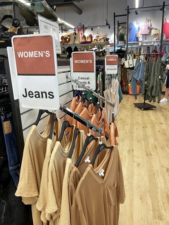 Navigate this canyon of curated clothing where yesterday's splurges become today's steals, organized with a precision that would make Marie Kondo weep with joy.